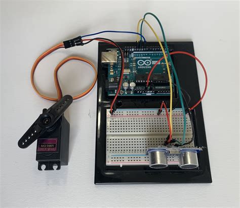 Ultrasonic Sensor And Servo Reactive Motion With Arduino 4 Steps