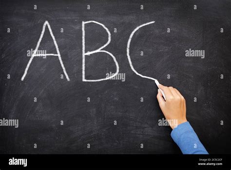Education Concept Abc Alphabet School Blackboard Concept School Teacher Writing Abc Alphabet