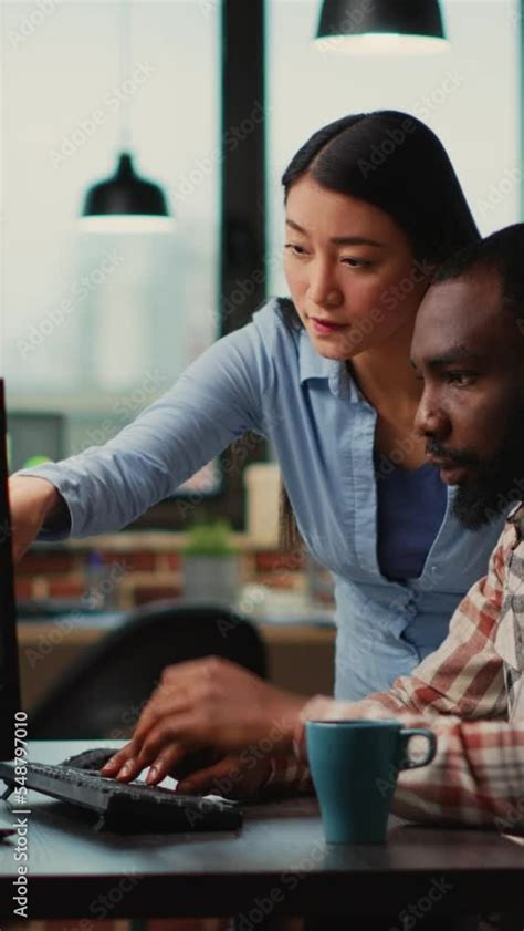 Vertical Video African American And Asian People Doing Teamwork To Create Engineering