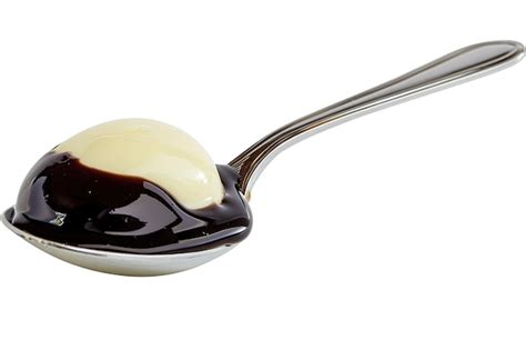 Premium Photo Pudding On Spoon Isolated