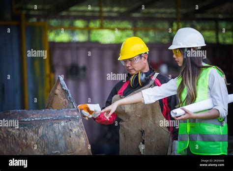 Asian Female Engineer Checks Workers Welds Stock Photo Alamy
