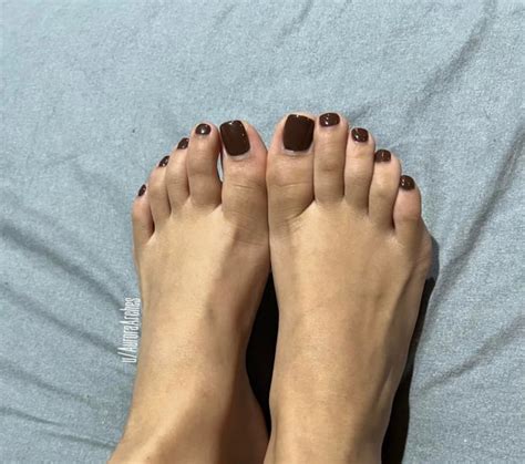 Light Latina Feet With Dark Brown Nails Like A Chocolate Chip Cookie