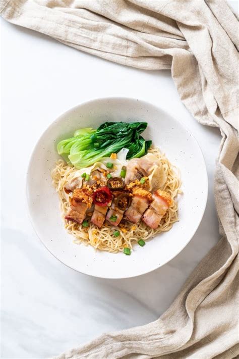 Egg Noodle Soup With Crispy Pork Belly And Wonton Stock Image Image Of Lunch Healthy 155629331