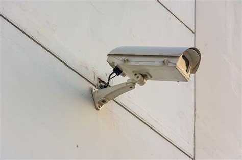 Premium Photo Three Frontal View Security Cameras On A Concrete Wall