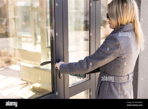 Female Entering Secret Key Code For Getting Access And Passing Building