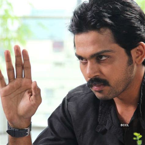 Pranitha And Karthi In A Still From The Tamil Movie Sakuni