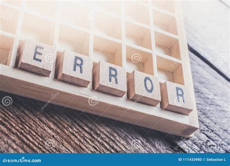 Closeup Of The Word Error Formed By Wooden Blocks In A Type Case Stock Photo Image Of Error