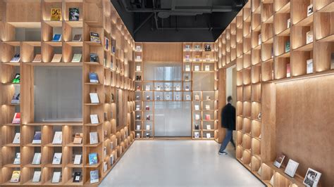 Has Uses Frosted Glass To Blur Boundaries For The Glade Bookstore