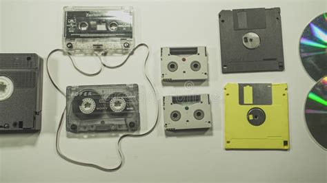 Data Storage Evolution Showing Transition From Vhs To Flash Drive Stock