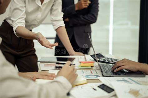 Professional Business Team Brainstorming Analyzing Sales Statistics