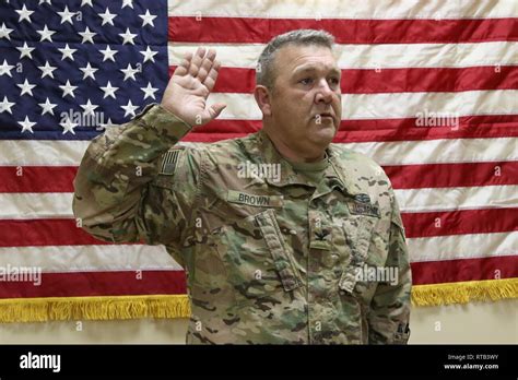 Col Jonathan Brown Recites The Oath Of Office Given By Brig Gen