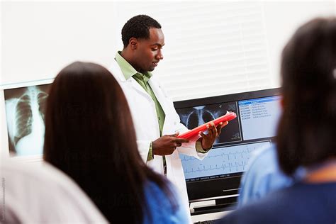 Doctors Doctor Lecturing Class By Stocksy Contributor Sean Locke Stocksy