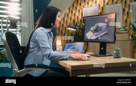 Female Asian 3d Designer At Home Working On 3d Modeling Project Of