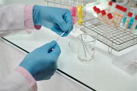 Premium Photo Scientist Using Litmus Paper