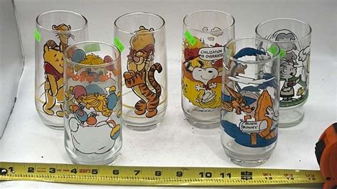 6 Character Glass Including Winnie The Pooh Bugs Bunny And Charlie Brown Metzger Property