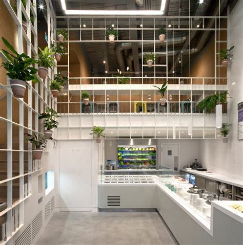 Pot Plants Cover Trellis Like Walls Inside London Cafe By Neiheiser Argyros