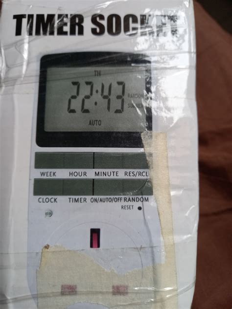 Timer Socket Tv And Home Appliances Electrical Adaptors And Sockets On