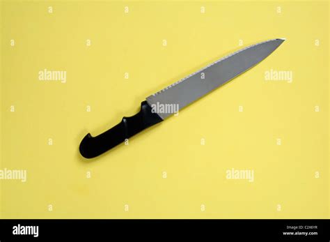 Serrated kitchen knife Stock Photo - Alamy