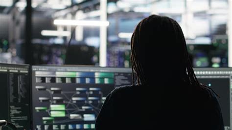 Data Center Engineer Using Algorithms To Analyze Datasets Putting On