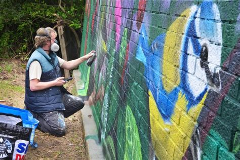 Hastings Artist Brightens Bexhill Alleyway With Colourful New Mural