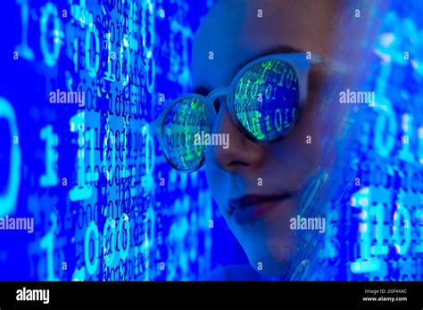 Female Computer Criminal Checking Binary Code On Computer Device Stock Photo Alamy