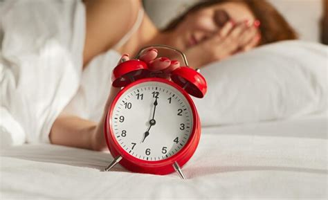 Premium Photo Woman Turning Off Alarm Clock