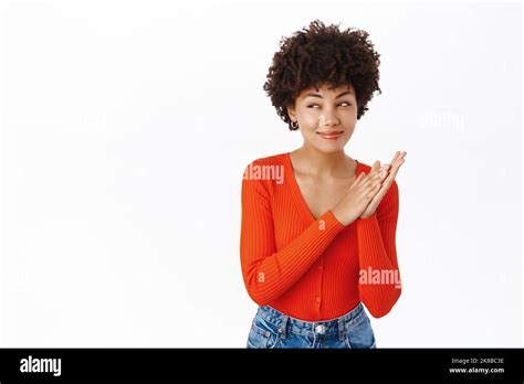 Smiling Sly Girl Rubs Her Hands Thinks Of Smth Has Plan Stands Over