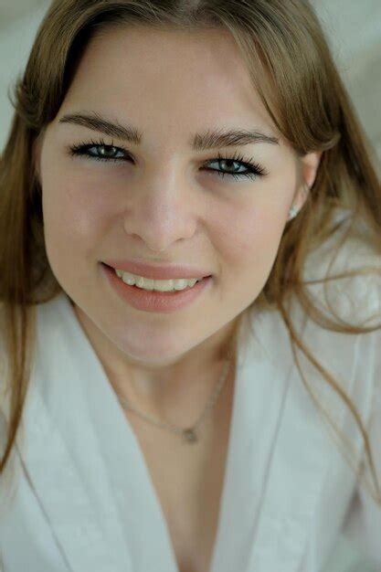 Premium Photo Young Pretty Girl With Long Straight Hair Posing In The