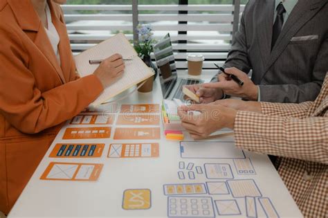 The Development Team Is Consulting On The Design Of The Website Ux Ui They Are Working On