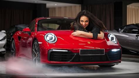 Beautiful Woman Hugging A Car In A Car Showrrom Premium Ai Generated Image