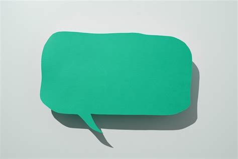 Premium Photo Color Paper In Shape Of Dialog Box With Important Message Infromation Written On