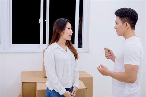 Premium Photo Woman Receiving A New House Key From Her Husband