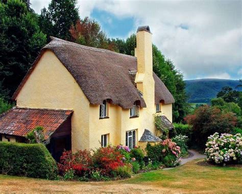 Una casa con techos de paja rompecabezas en línea