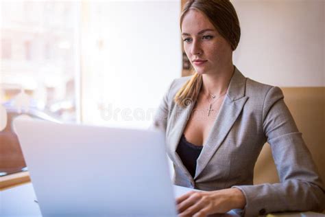 Female Skilled Copywriter Typing Promotional Text For Advertising Site Using Modern Netbook