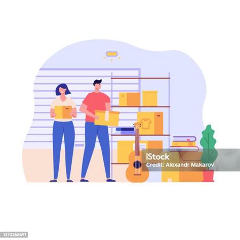 개인 물품을 대여 셀프 스토리지 단위로 보관하는 가족 상자를 들고 있는 남자와 여자 자체 저장 장치 작은 미니 창고 임대 차고의