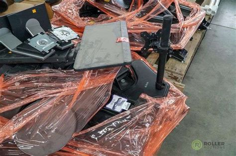 2 Pallets Of Keyboard Trays And Monitor Stands Roller Auctions