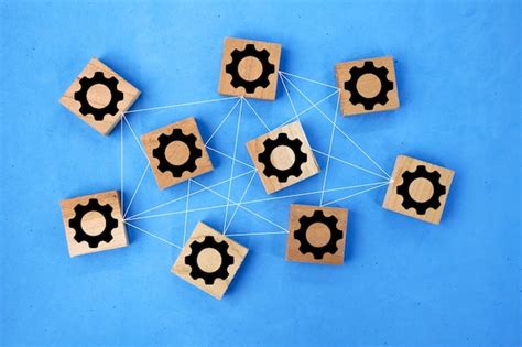 Premium Photo Wooden Squares With Gear Or Management Icons Connected To Each Other Efficient