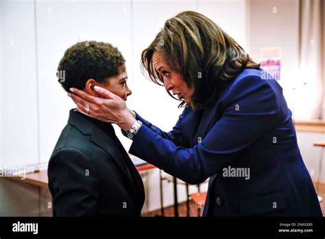 Senator Kamala Harris Embraces Her Godson Alexander Hudlin 11 Left Ahead Of Her Presidential