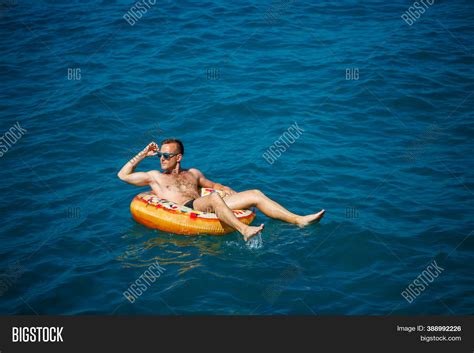 Babe Man Floats On Image Photo Free Trial Bigstock