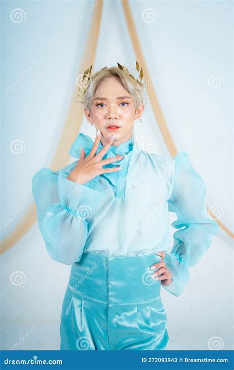 A Princess With A Blue Dress And Blonde Hair Posing Very Beautifully Stock Image Image Of Blue