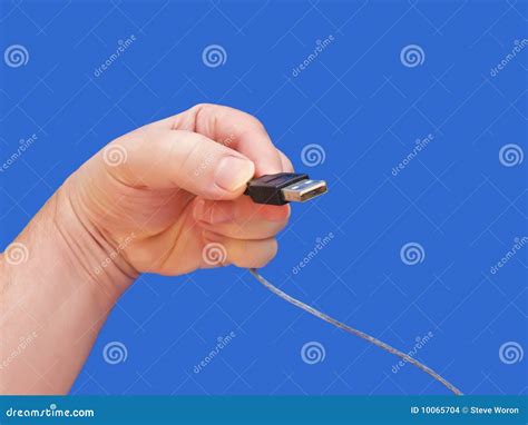 Hand Holding USB Cable Blue Background Stock Photo Image Of Plug Cable