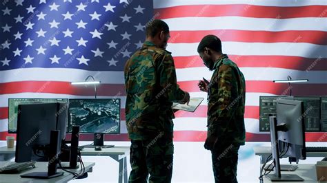 Premium Photo Us Soldiers In A High Tech Command Center Protecting Classified Information