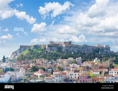 Skyline Of Athenth With Moanstiraki And Acropolis Hill With Cloudy Sky