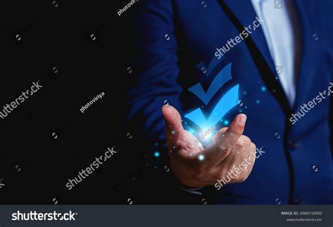 Checklist Concept Businessman Showing Check Mark Stock Photo 2068732850 Shutterstock