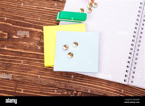Opened Blank Notebook Frame Of School Supplies Over A Retro Wooden