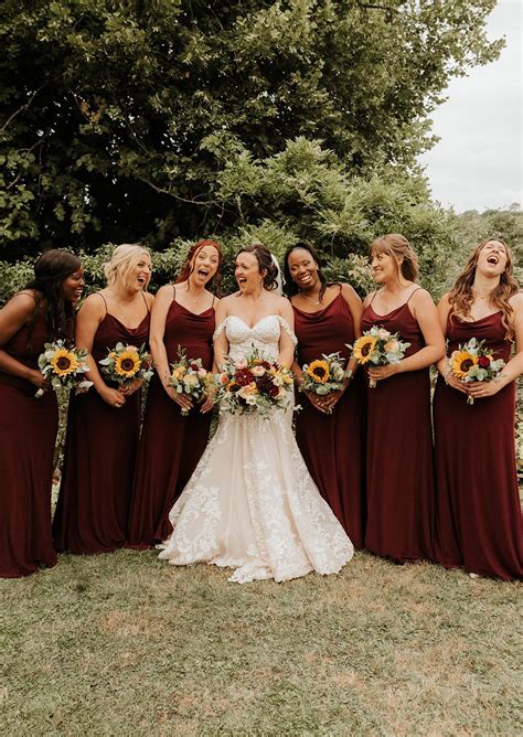 Autumnal Dewsall Court Wedding With Sunflowers And Red Bridesmaid Dresses