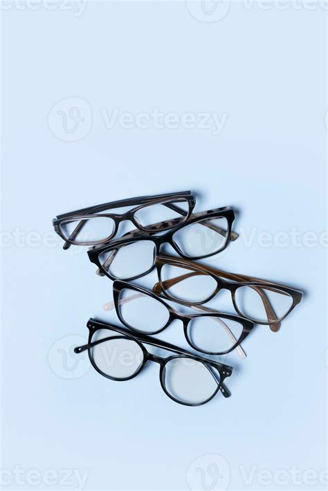 Eyeglasses On Blue Background With Copy Space Optical Store Vision Test Stylish Glasses