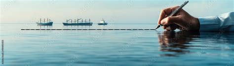 Hand Drawing A Border Line Across An Open Sea With Ships Waiting Trade