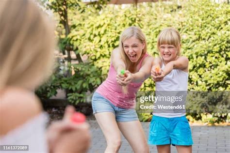 Two Girls Squirting Photos And Premium High Res Pictures Getty Images