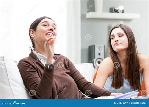 Mother And Daughter Having An Animated Talk Stock Image Image Of Home